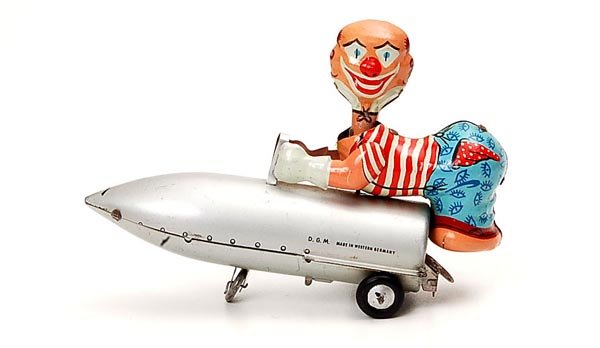 Karl Bub Clown on Rocket - Antique Toys Library